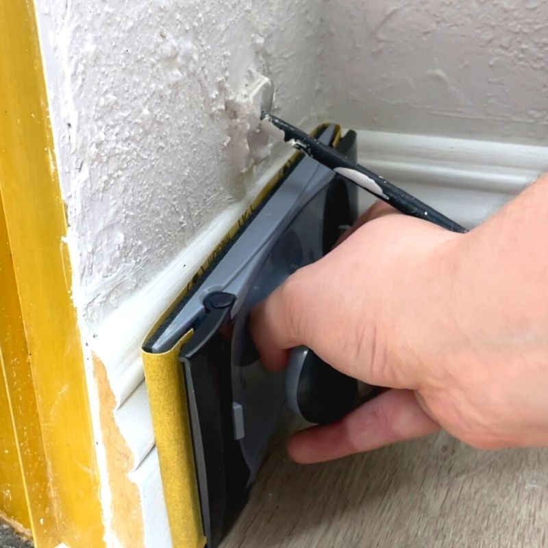 Patching up an old telephone wire hole – Character