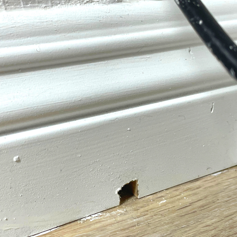 Patching up an old telephone wire hole – Character